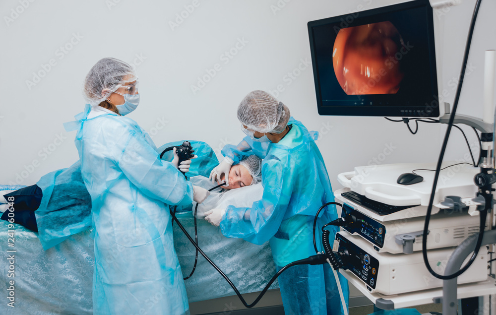 Endoscopy at the hospital. Doctor holding endoscope before gastroscopy ...