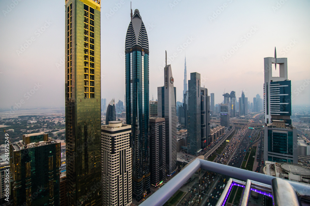 Dubai skyline and downtown skyscrapers on sunset. Modern architecture ...