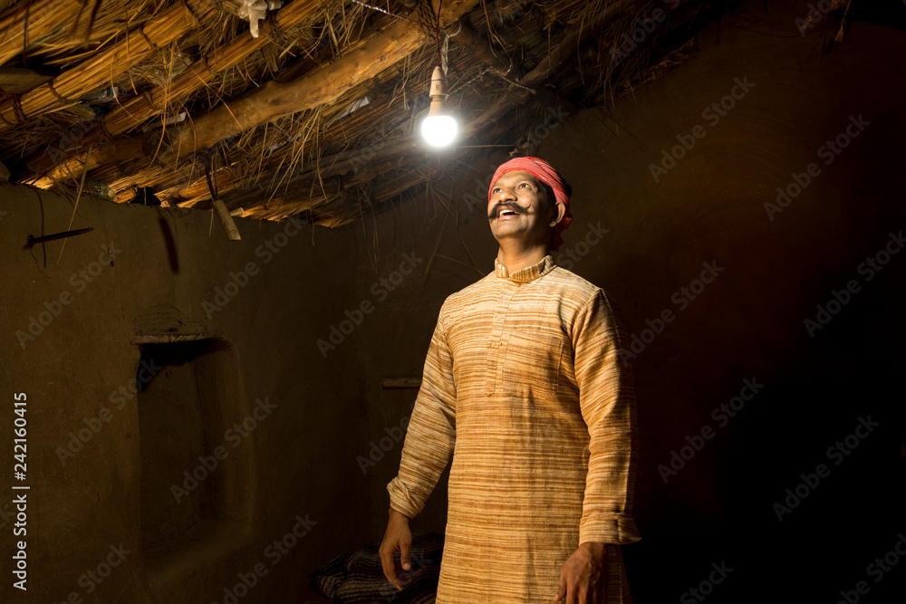 Rural Indian man delighted on electricity reaching her home Stock Photo ...