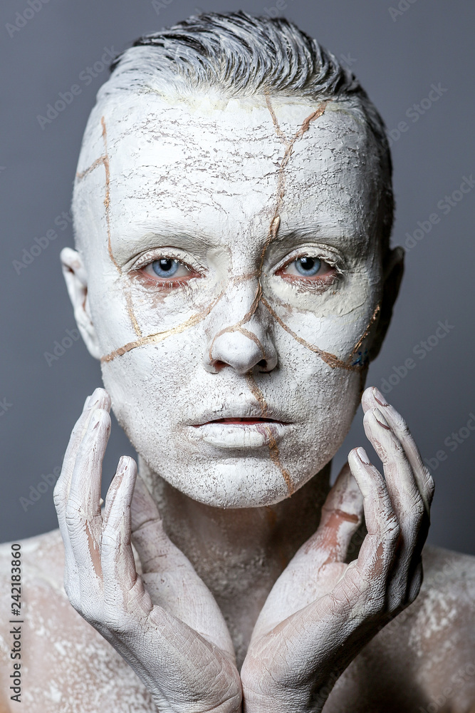 Art portrait of woman covered in clay Stock Photo | Adobe Stock