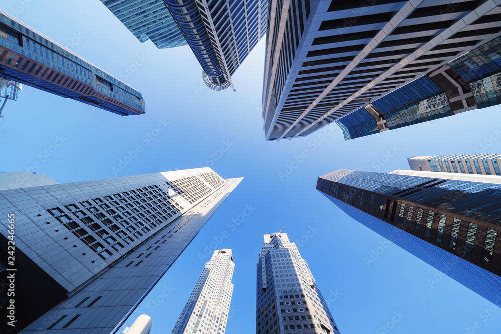 Looking up to high-rise buildings, skyscrapers, architectures in smart ...