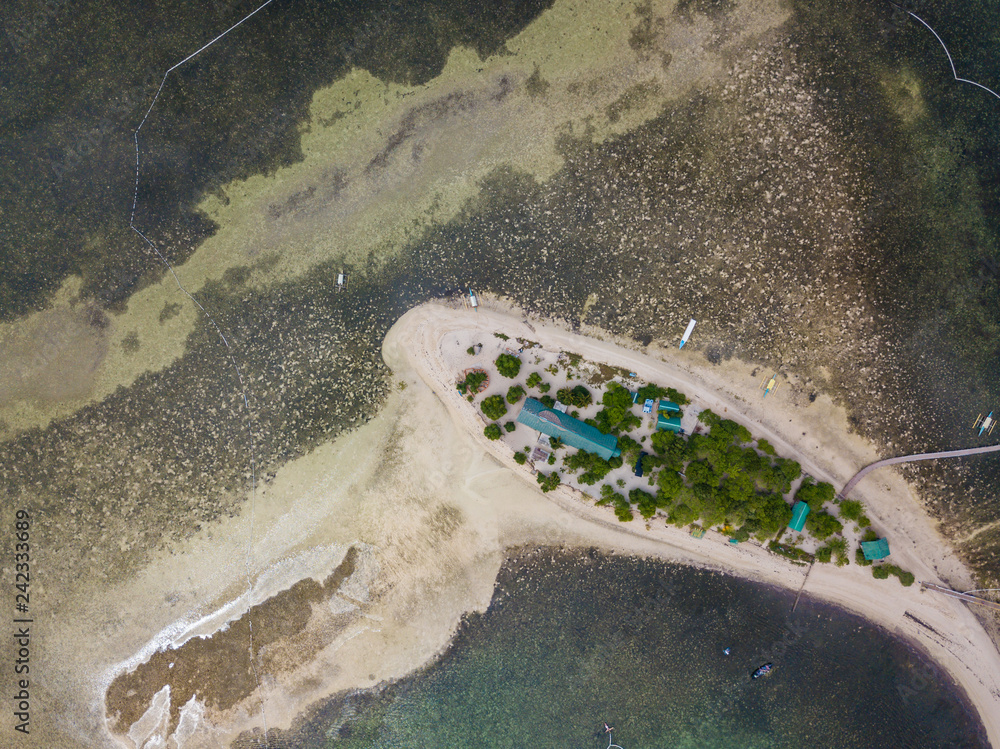 Aerial view of curved beach of Pontod virgin island located near ...
