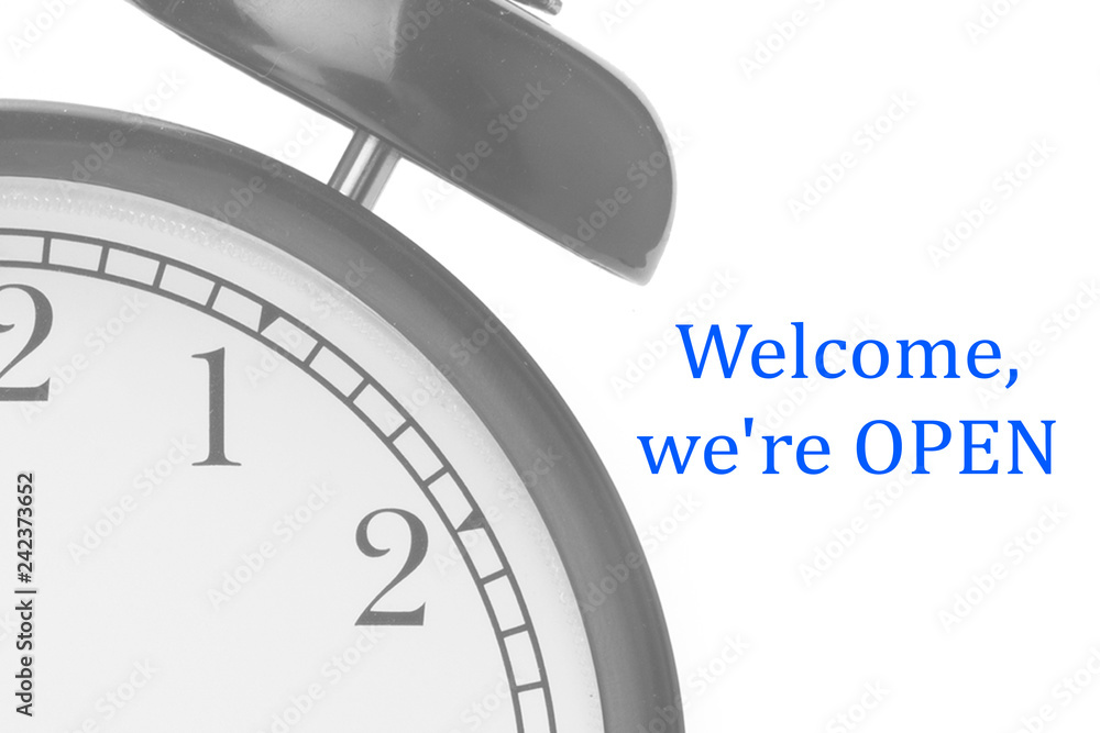 Welcome we're OPEN sign in blue and white, on shop door Stock Photo ...