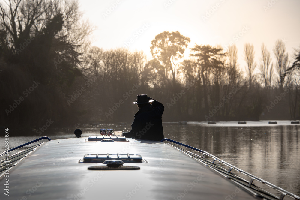 man stood on bow of boat shields his eyes as nuclear bomb explodes in ...