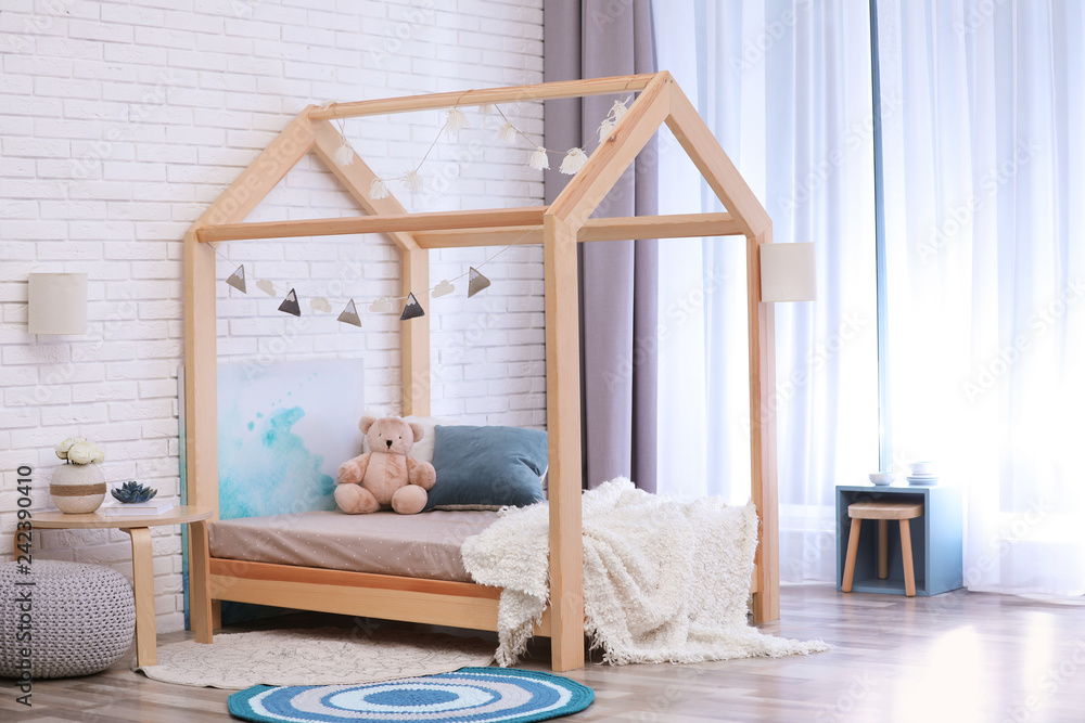 Stylish child room interior with cute wooden bed Stock Photo | Adobe Stock