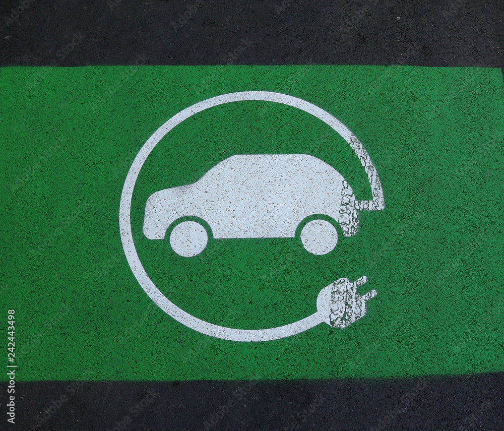 Electric vehicle parking sign, with charging station, painted on ...
