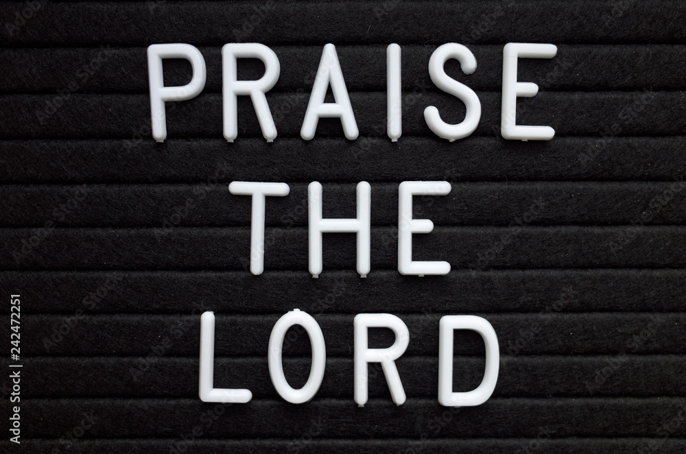 The Words Praise The Lord In White Plastic Letters On A Black Letter The Words Praise The Lord In White Plastic Letters On A Black Letter