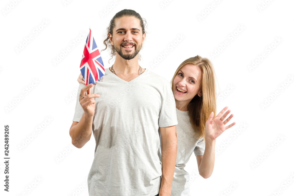 Hello! Happy couple in gray t-shirts with the flag of Great Britain ...