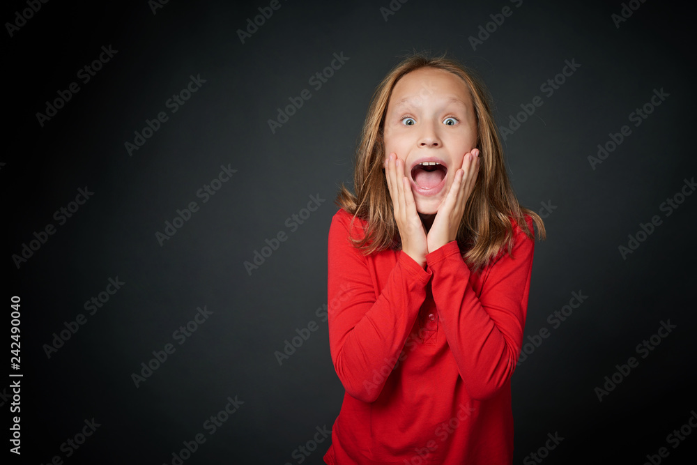 Scared girl shouting looking at camera Stock-Foto | Adobe Stock