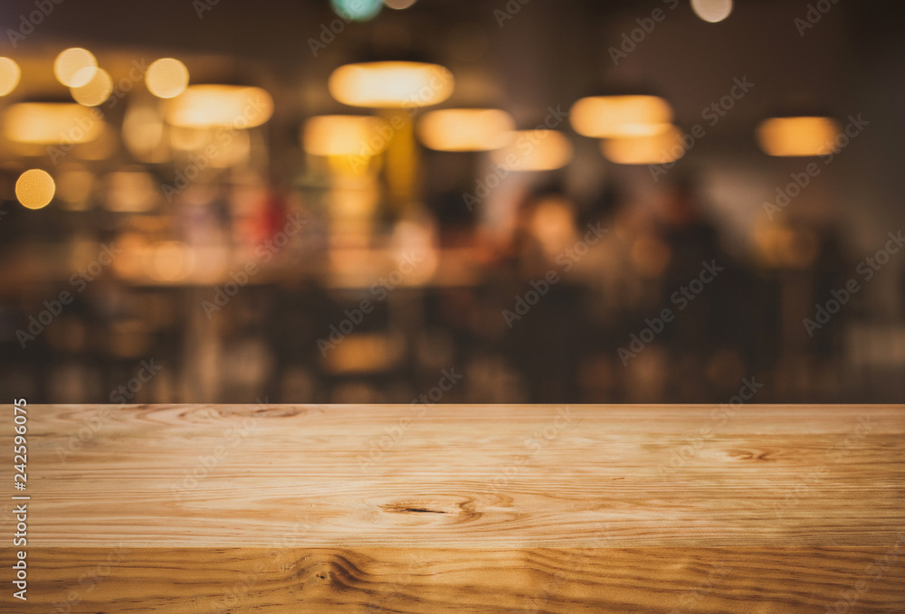 Wood texture table top (counter bar) with blur light gold bokeh in cafe ...