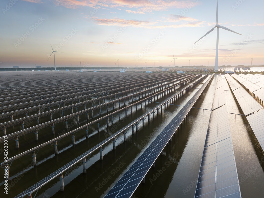Solar panels and wind power, clean energy in nature Stock Photo | Adobe ...