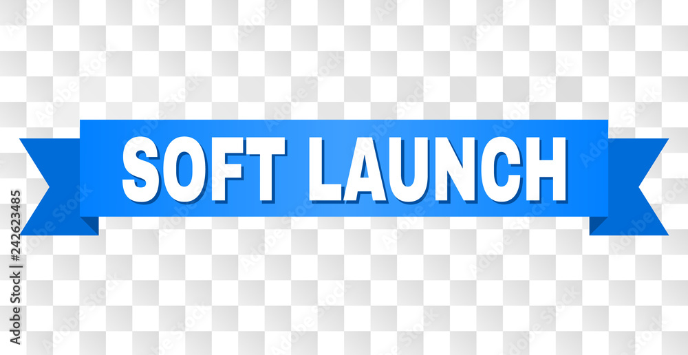 SOFT LAUNCH text on a ribbon. Designed with white title and blue tape ...