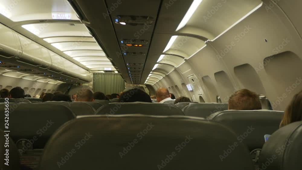 Look inside the cabin of the plane with the passengers during the ...