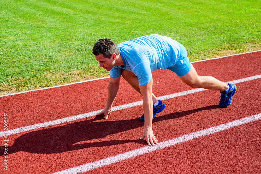 Adult runner prepare race at stadium. How to start running. Sport tips ...