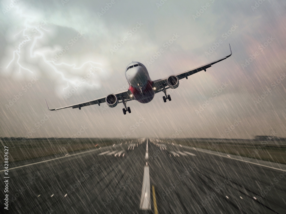 Foto Stock Lightning strike on an airplane in bad weather raining ...