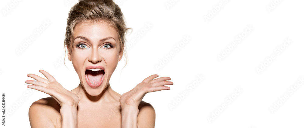 Portrait of surprised pretty blonde model overwhelmed with emotions ...