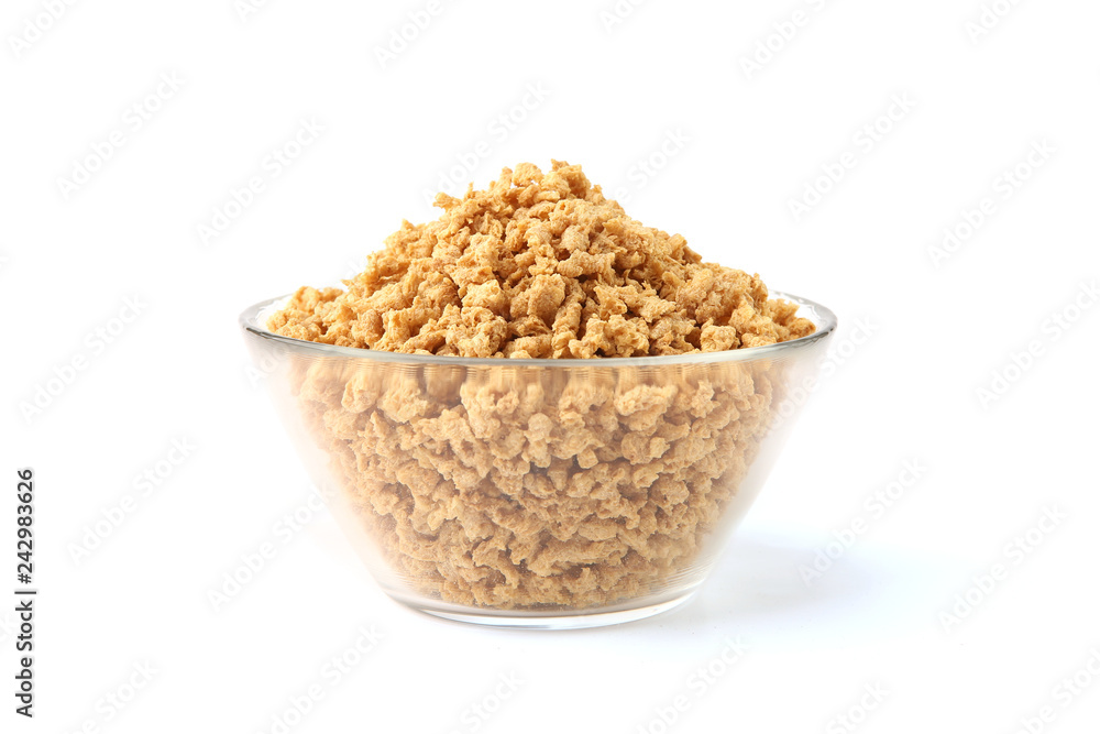 Raw soy mince in glass bowl isolated on white background. Dry soya ...