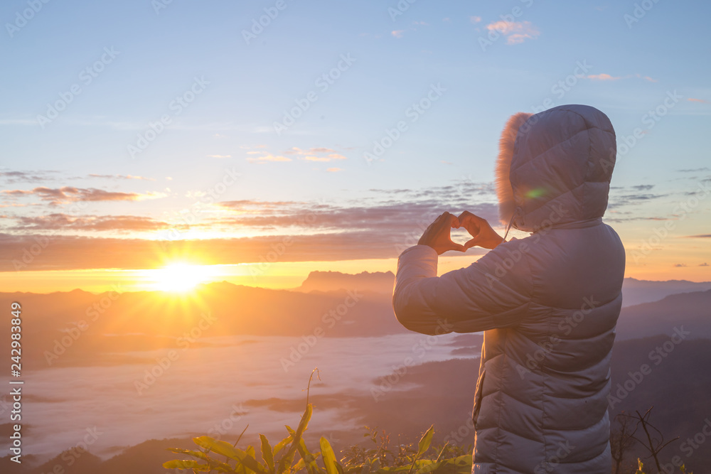 Woman making heart shape during sun rise, God is love concept, Heart ...