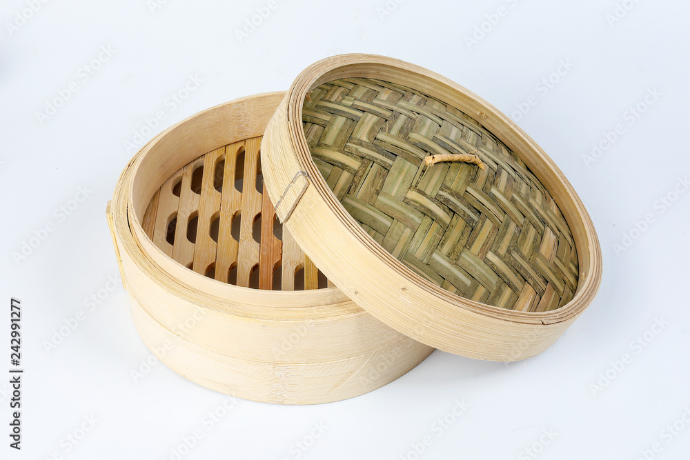 Wooden bamboo dim sum steamer on white background Stock Photo | Adobe Stock