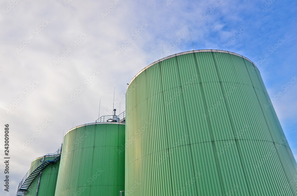 Three biogas tanks on a biogas station. Wastes recycling ecology ...
