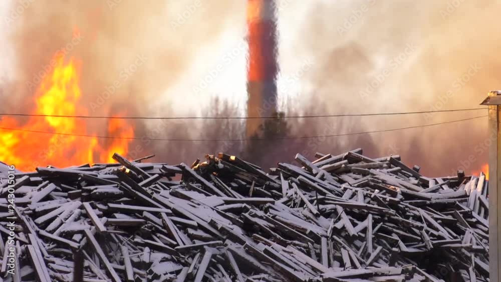 Fire at the industrial site. Firefighters extinguish a fire at the ...