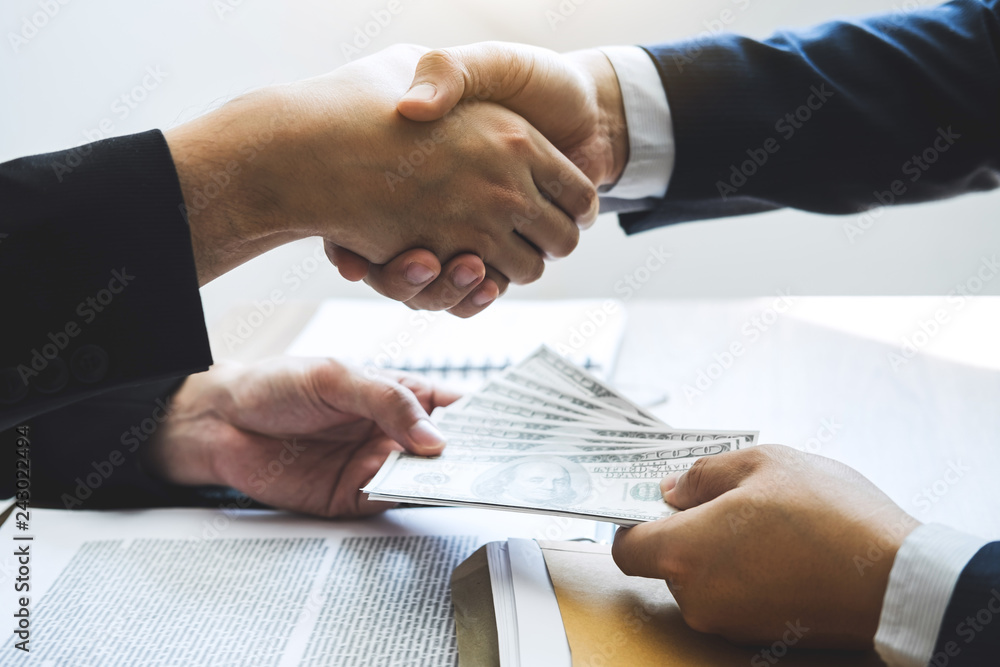 Dishonest cheating in business illegal money, Businessman handshake ...