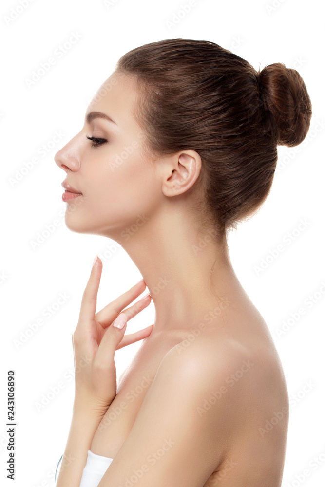 Portrait of young beautiful caucasian woman touching her neck isolated ...