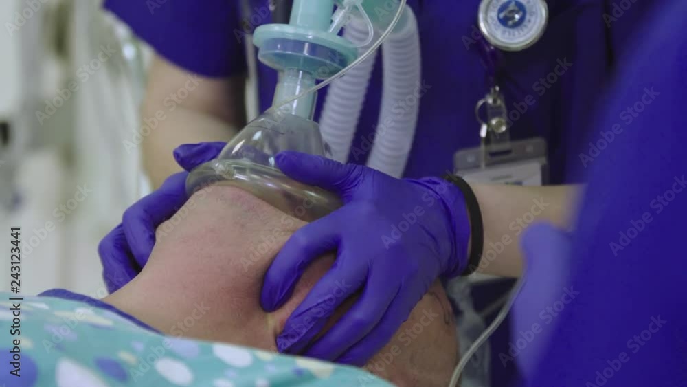 Full process of intubation patient from pressing a mask to his face to ...
