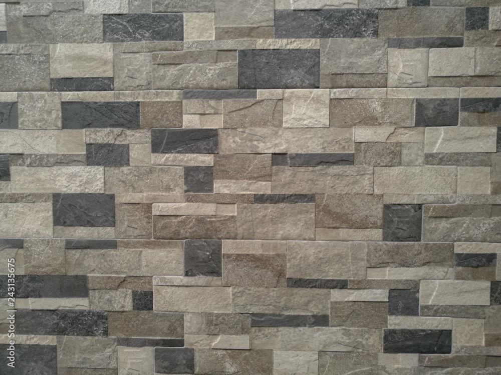Grey brick stone wall texture or background material of industry ...