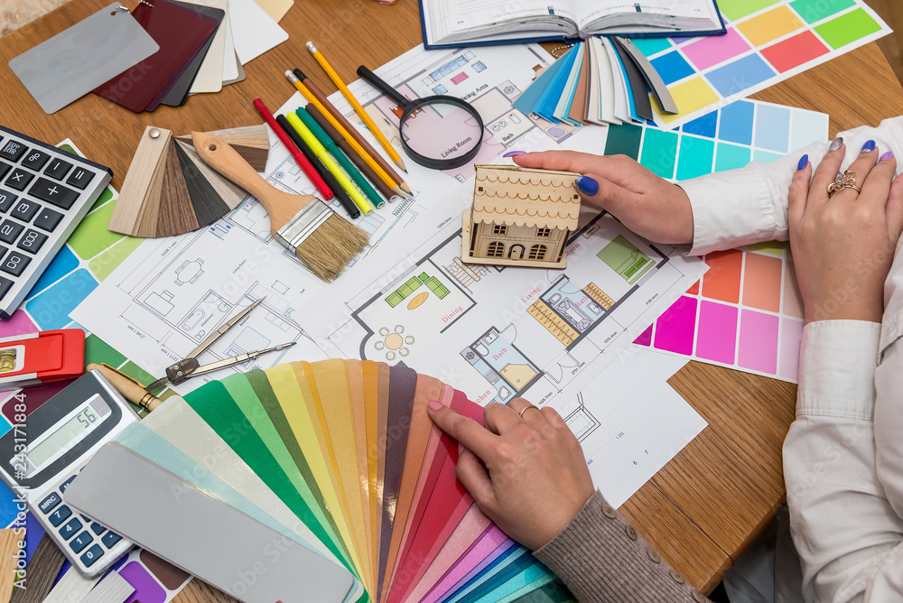 Teamwork of creative designers working with colour palette Stock Photo ...