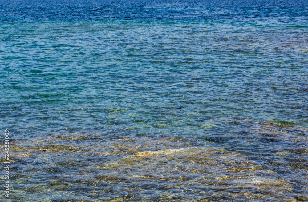 vivid blue tropic sea transparent water surface perspective ...