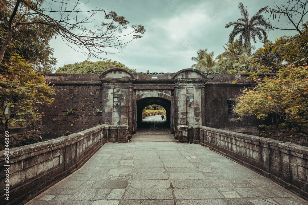The stone bridge leading to the Fort Santiago entrance. Intramuros ...