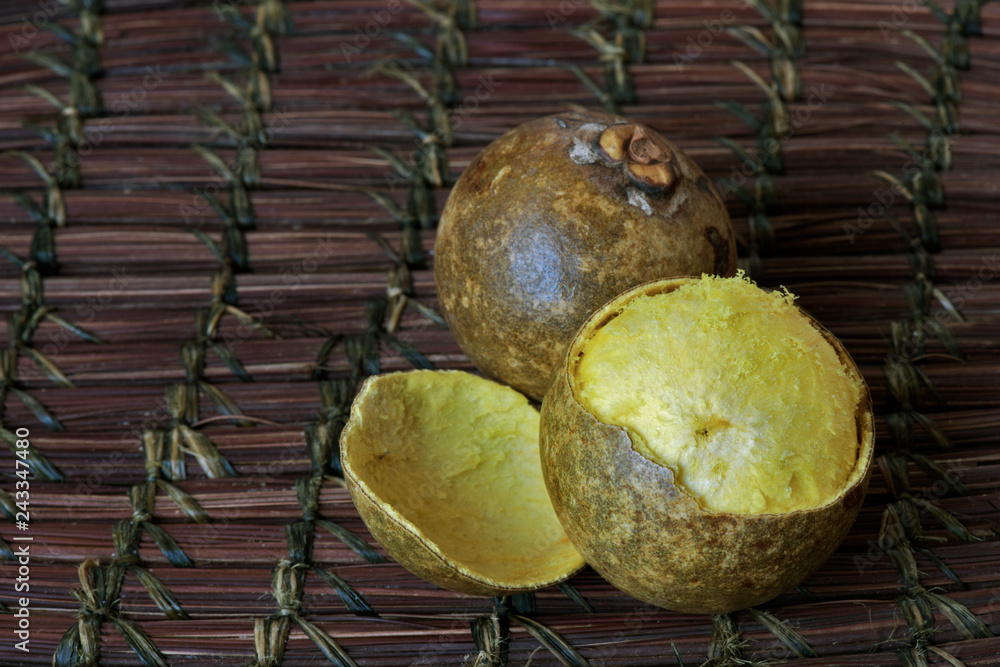 Foto de Brazilian fruit: stack of macauba on wicker basket do Stock ...