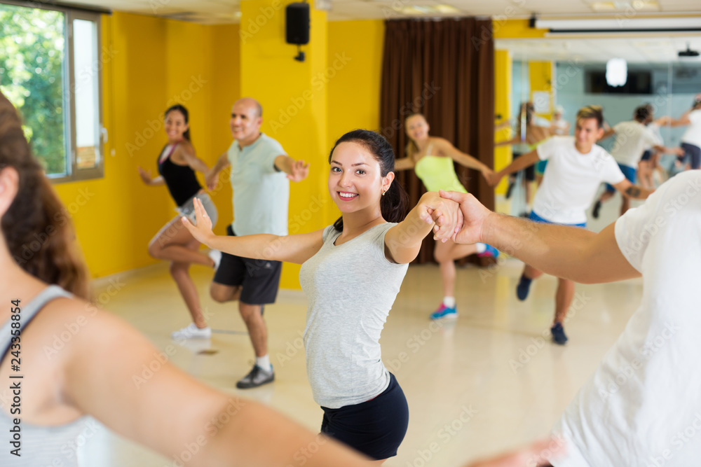 Dancing couples enjoying active swing Stock Photo | Adobe Stock