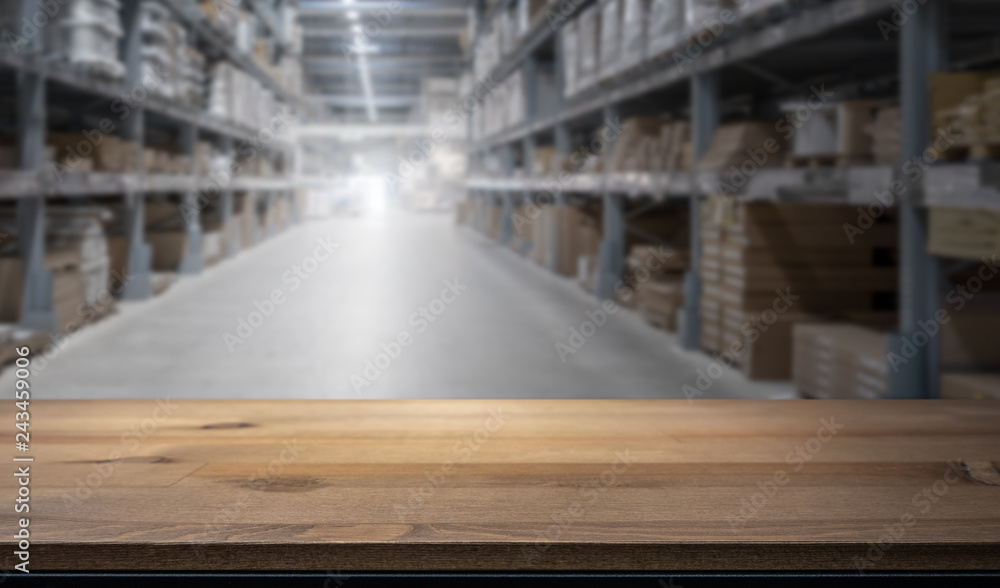 Wooden table top for product display montage. Blured shelves with goods ...