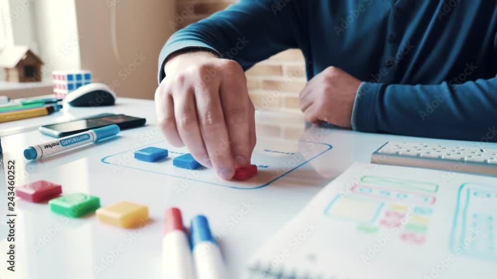 Mobile Application Designer Is Working And Research On The Interface Of The Modern Mobile