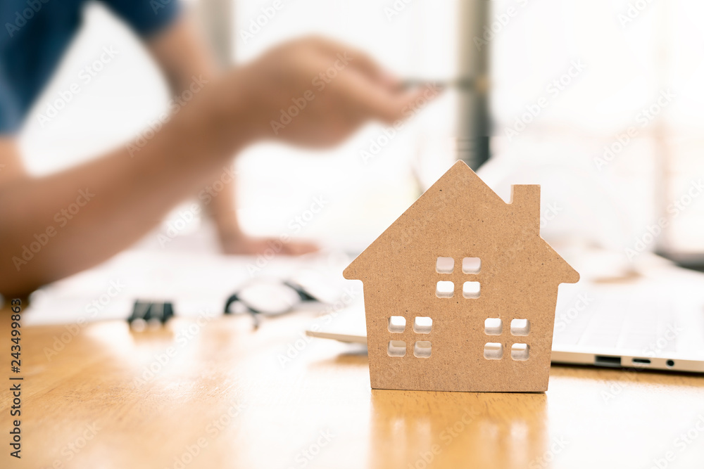 architect or civil engineer during drawing home or building in office ...