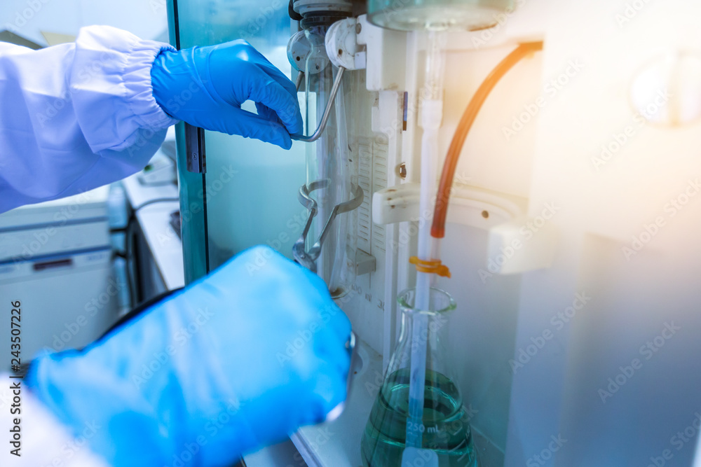 Food scientists are using a protein analyzer. Nutritional analysis ...