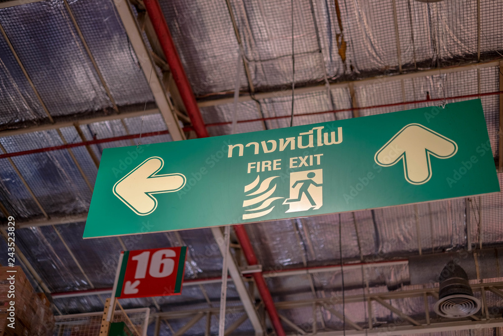 fire exit sign. way to escape of danger Stock Photo | Adobe Stock