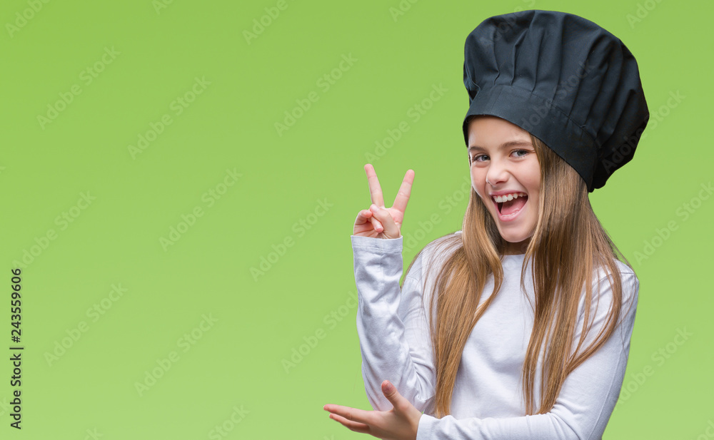 Young beautiful girl wearing chef hat uniform over isolated background ...