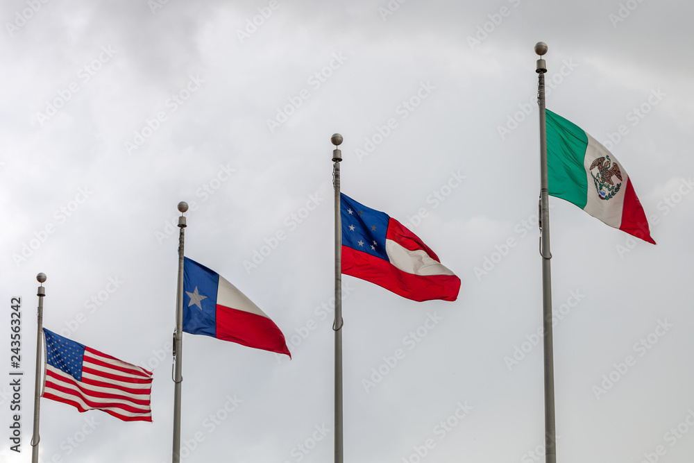 Flags of the Untied States of America, the state of Texas, the first ...
