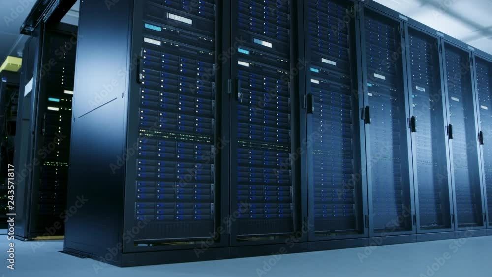 Low Angle Moving Shot of Data Center With Multiple Rows of Fully ...