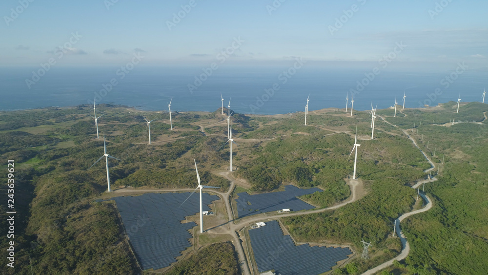 Aerial view of Windmills for electric power production on the seashore ...