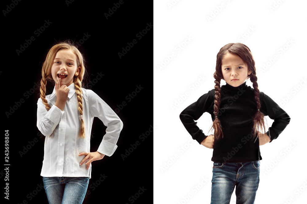 The portrait of two emotional happy surprised girl and serious angry ...