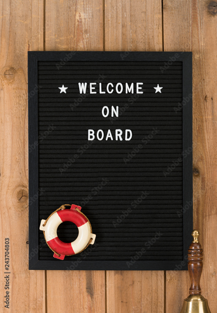 Welcome on board written on felt message board with maritime symbols ...