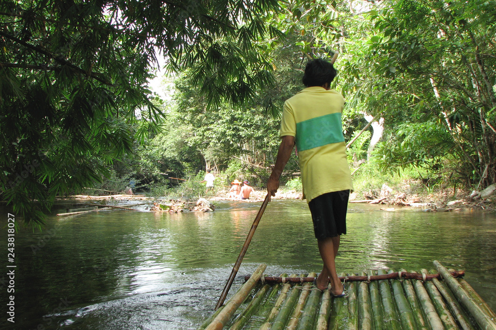 Rafting on bamboo rafts on a mountain river in Khao Lak Park, Thailand ...