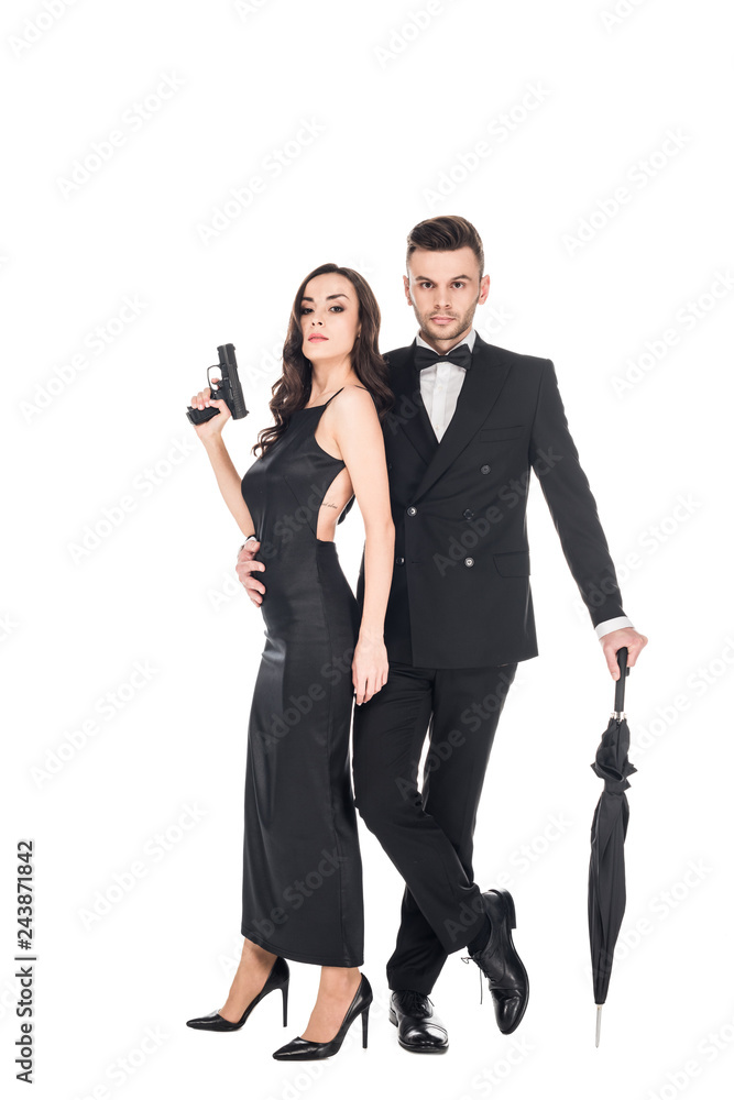 beautiful couple of killers in black clothes holding gun and umbrella ...