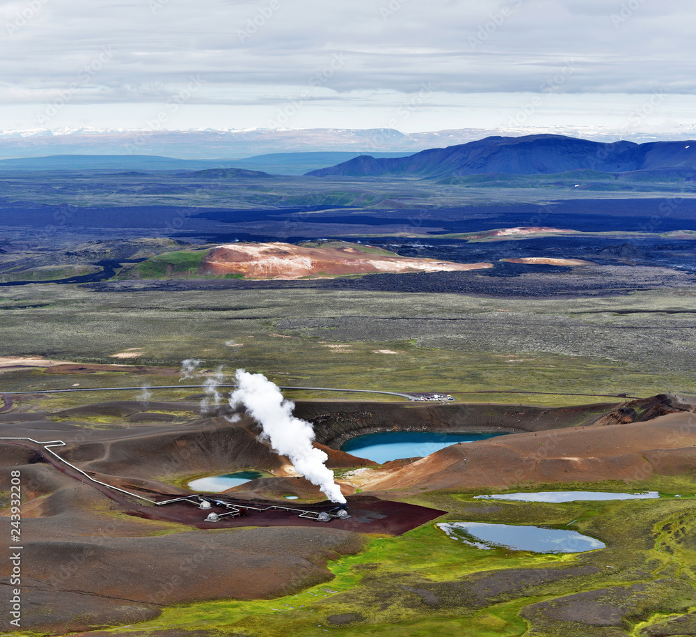 Active steam stack and parts of Krafla geothermal power plant next by ...