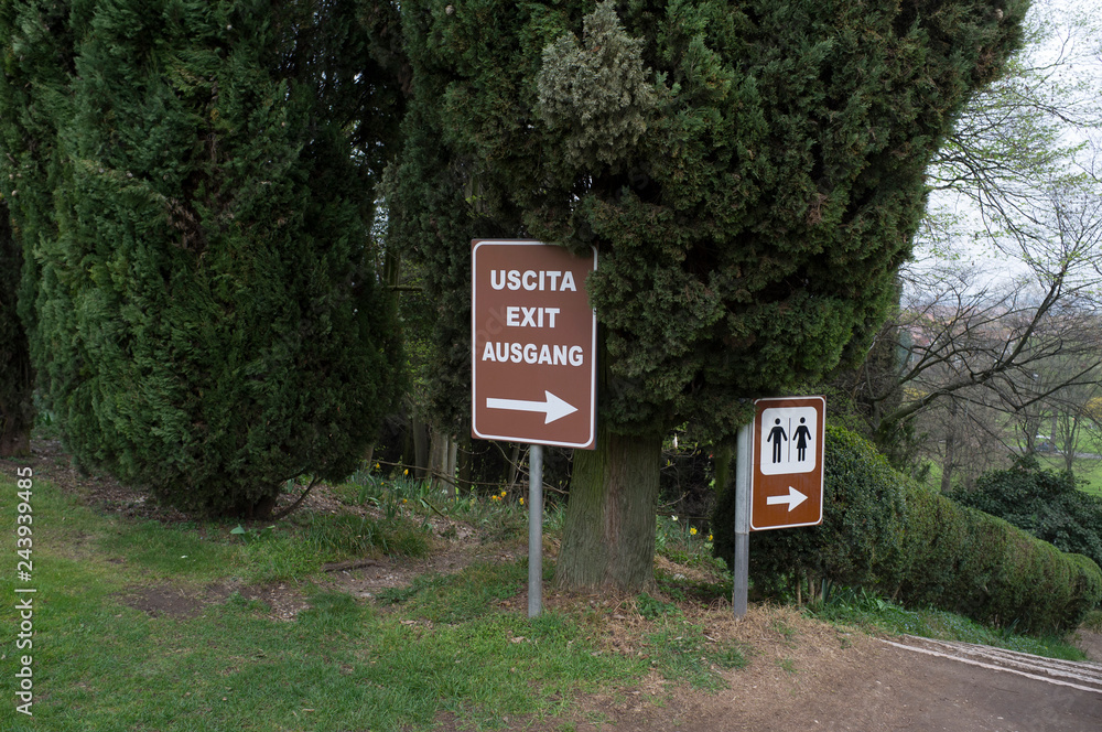 exit signs at park / multilanguage exit brown sign at park Stock Photo ...