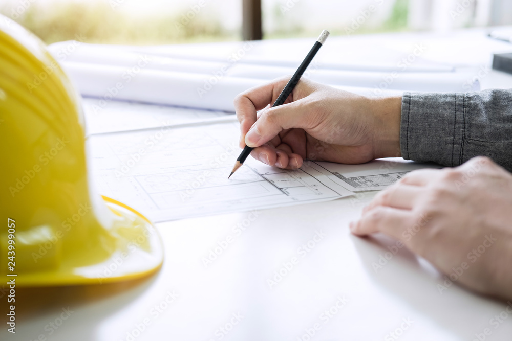 Construction engineering or architect hands working on blueprint ...
